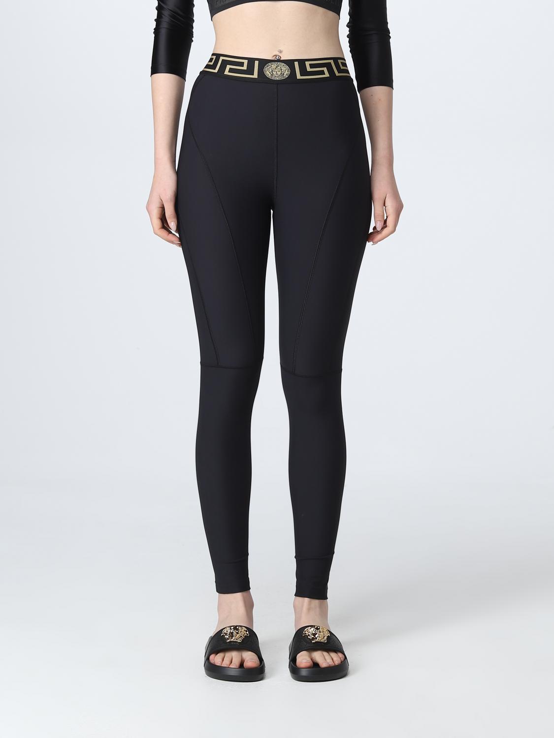 VERSACE: pants in stretch nylon - Black | Versace pants 10041031A06229 ...