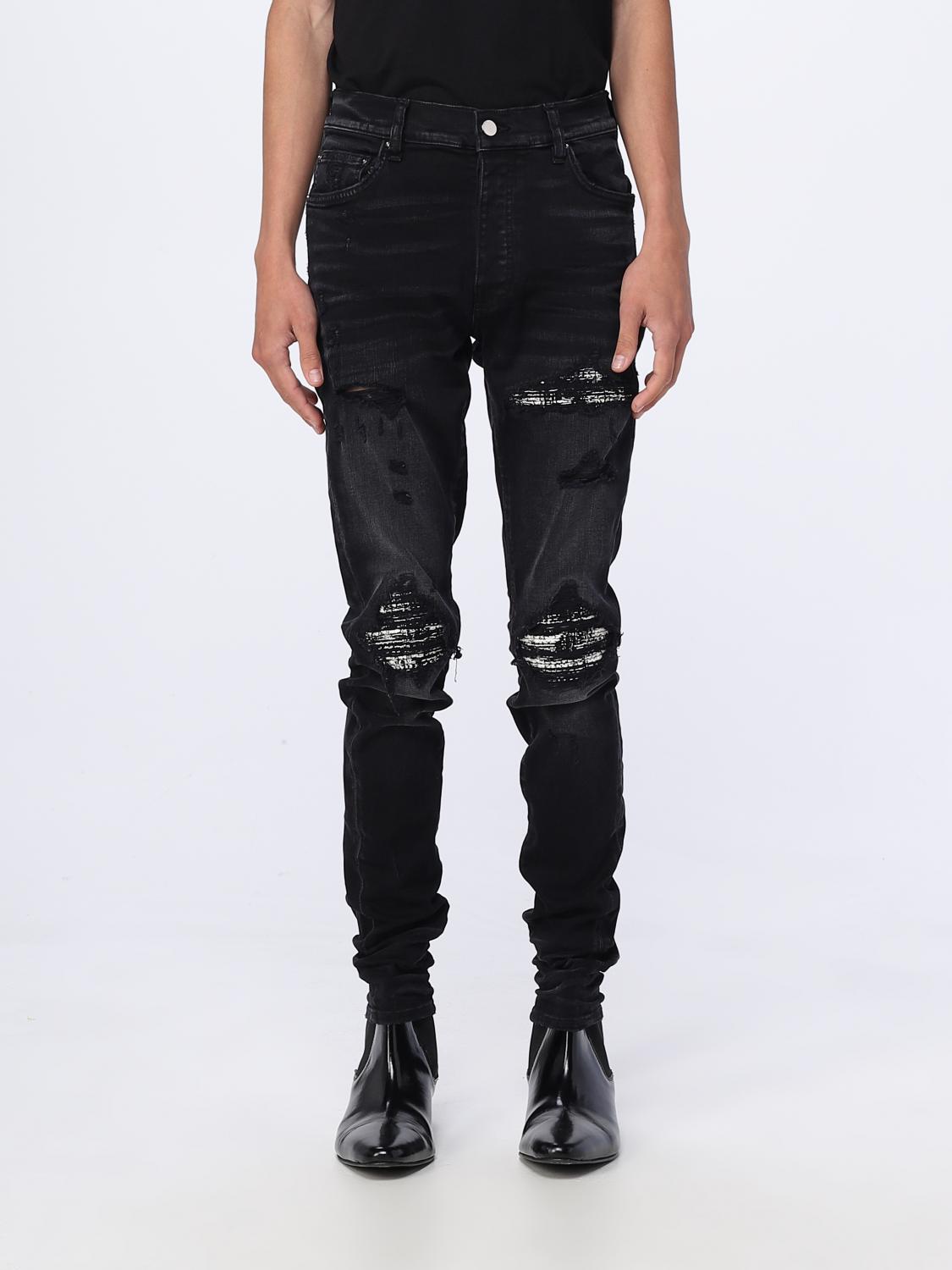 AMIRI: Jeans in denim - Nero | Jeans Amiri MDS010 online su GIGLIO.COM