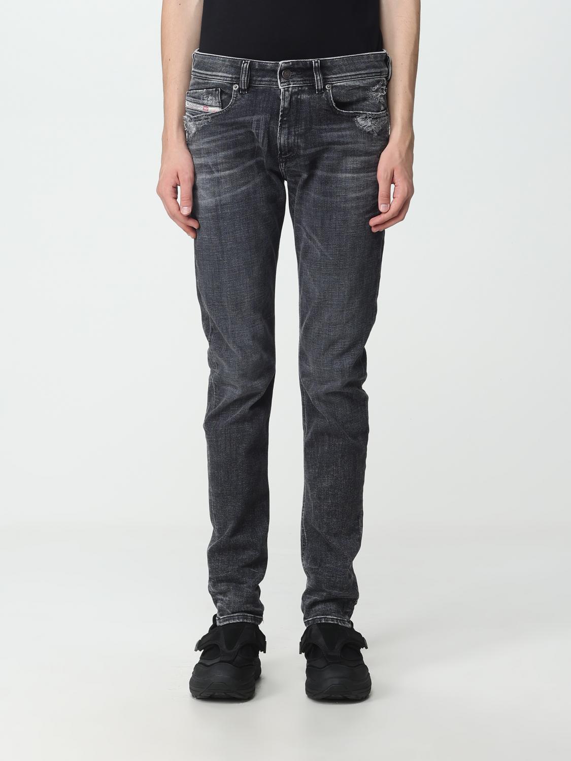 DIESEL: jeans in distressed effect denim - Black | Diesel jeans ...