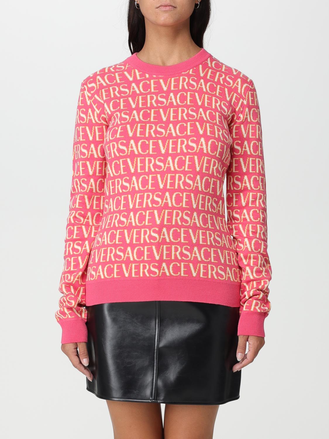 VERSACE: sweater in cotton blend with all-over logo - Fuchsia | Versace ...