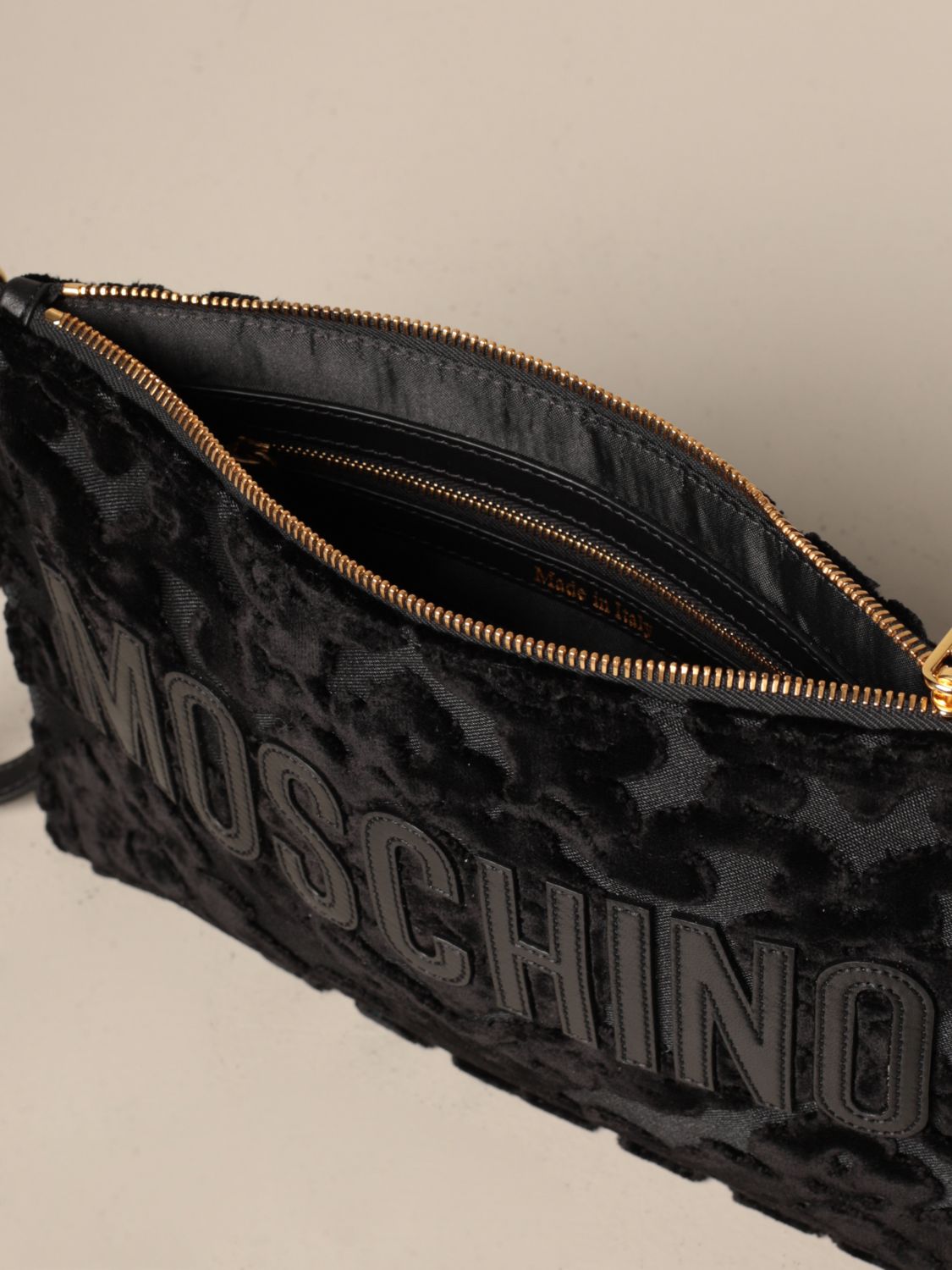 MOSCHINO COUTURE: brocade clutch bag with logo - Black | Clutch ...